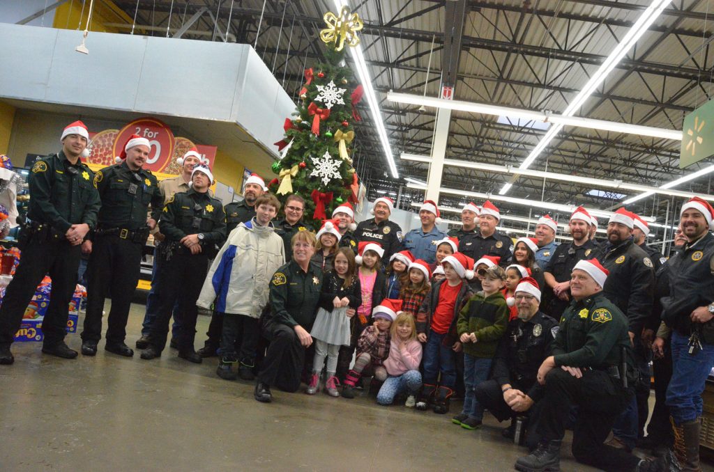 Shop with a Cop makes Christmas merry for Craig kids, families ...