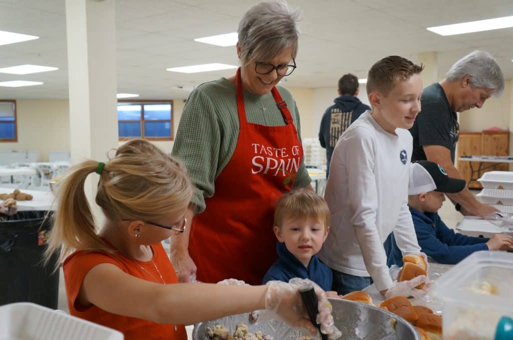 Photos: Volunteers pack St. Michael’s Community Kitchen to help prep ...