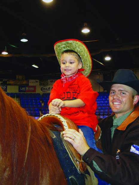 Cowboys and cowgirls horse around with kids in Minot | TSLN.com