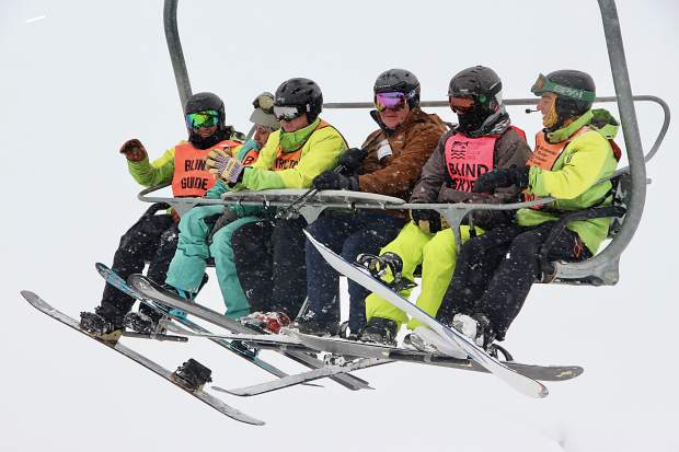 Photos: Blind skiers take to the fresh pow at Breckenridge Ski Resort ...