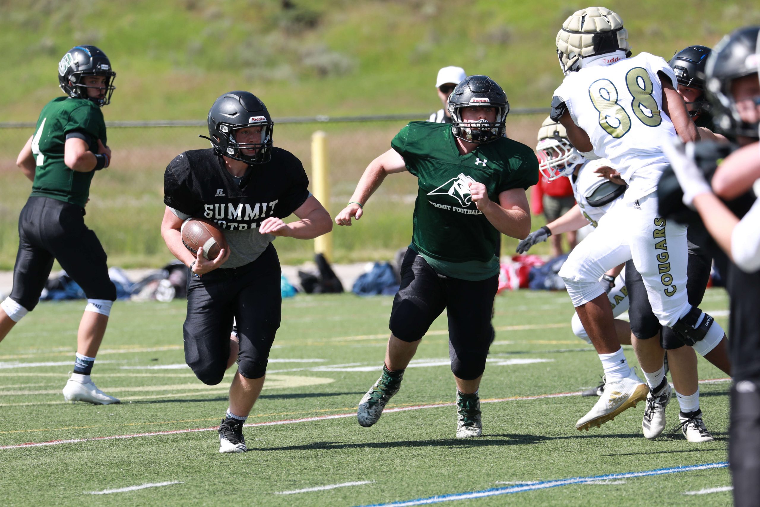 Summit High School football impresses in preseason scrimmage with new ...