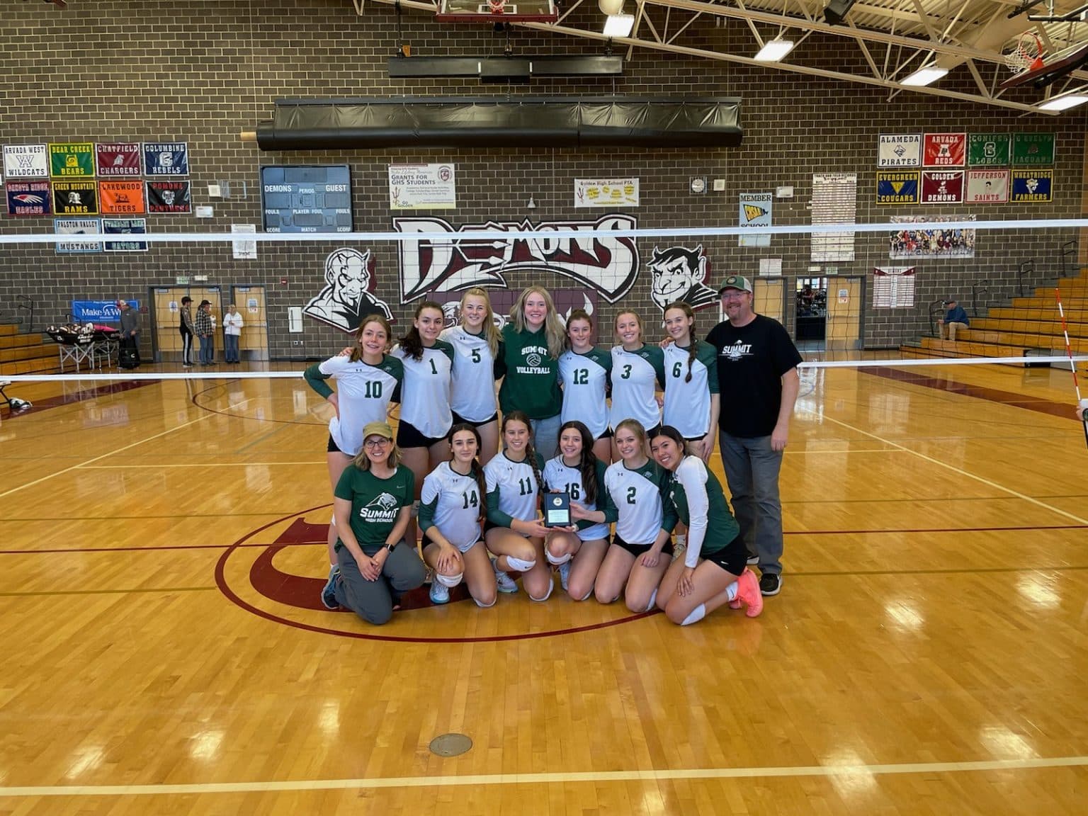 Summit volleyball concludes season with a win and loss at regionals ...