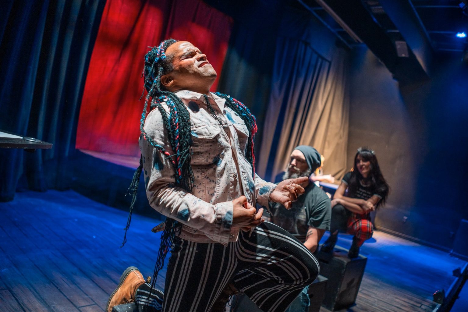 Actors prepare to shred on air guitar in Breckenridge Backstage Theatre’s newest production ...