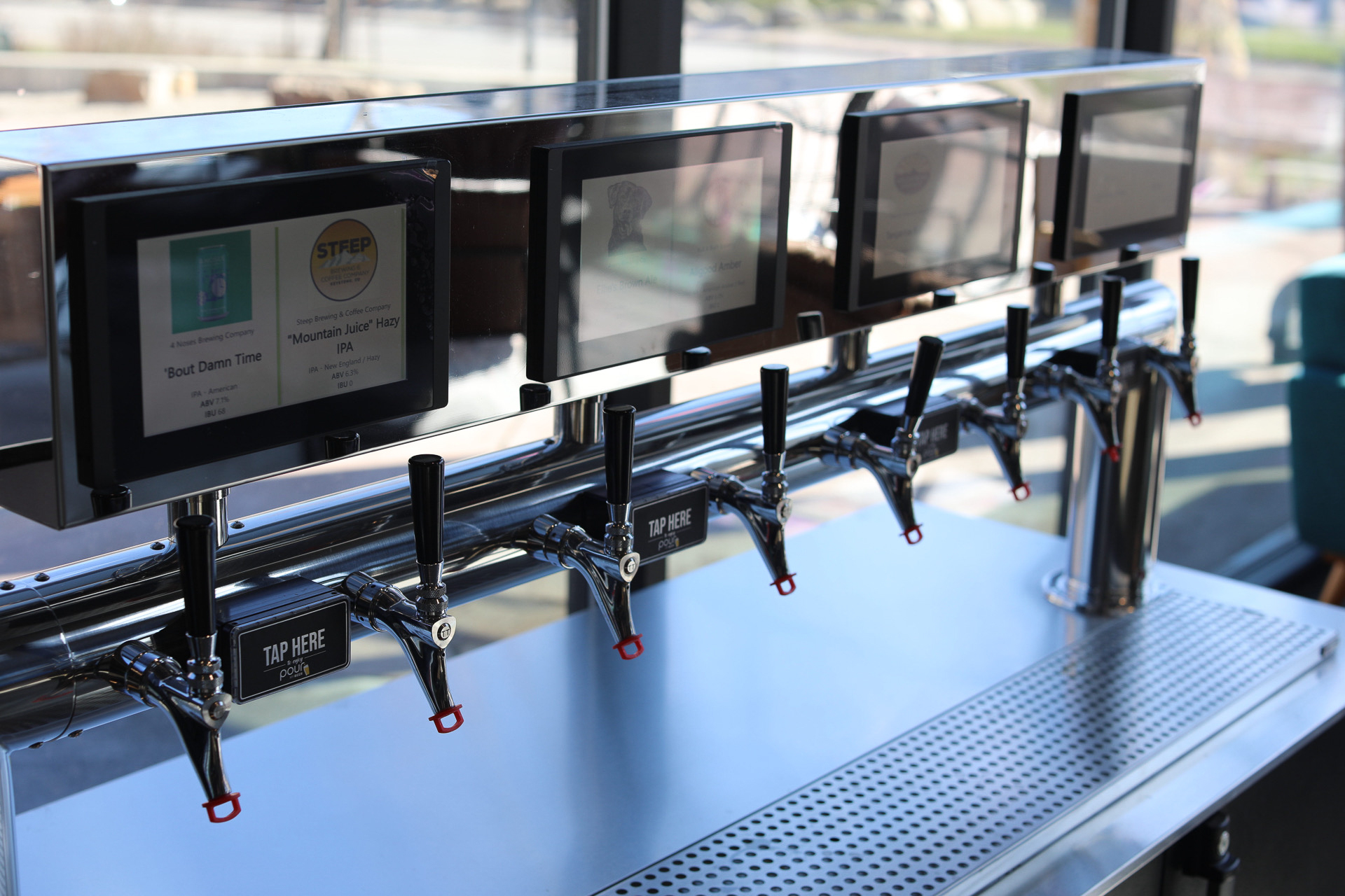 Slides and climbing obstacles for the kids — and self-serve beer for ...