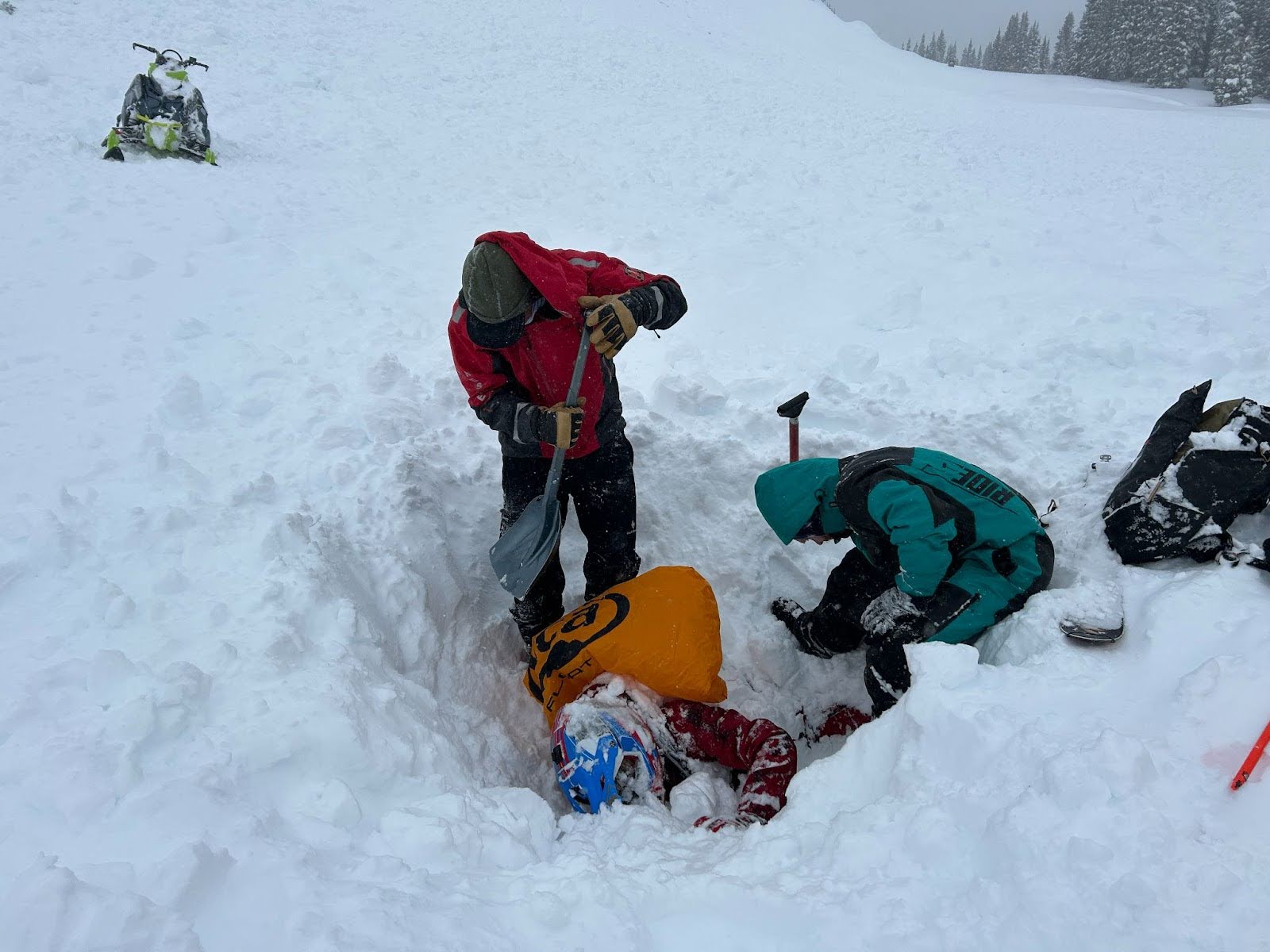 Snowmobiler who survived for more than an hour after being fully buried ...