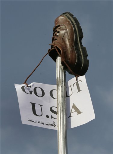 Across Mideast, Arabs hail shoe-hurling journalist | AspenTimes.com