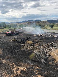 Crews keep wildfire near New Castle to less than 5 acres; unattended ...