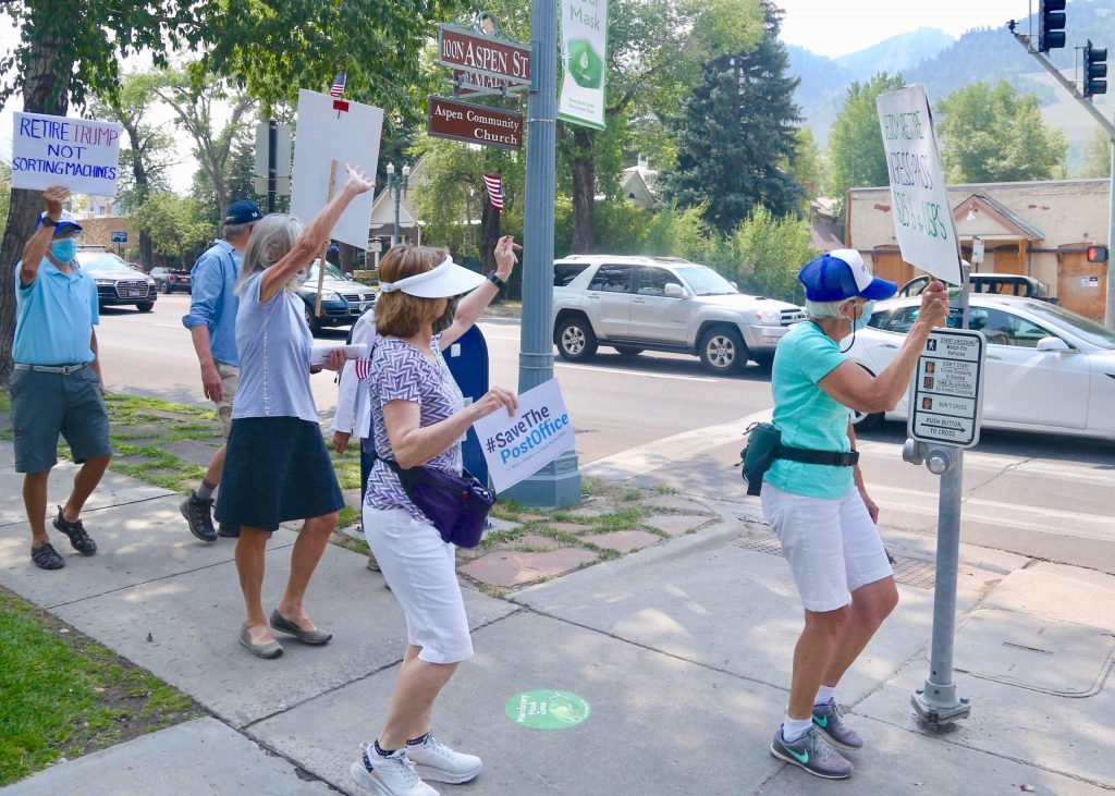 Small group marches in Aspen in effort to save the post office, protest ...