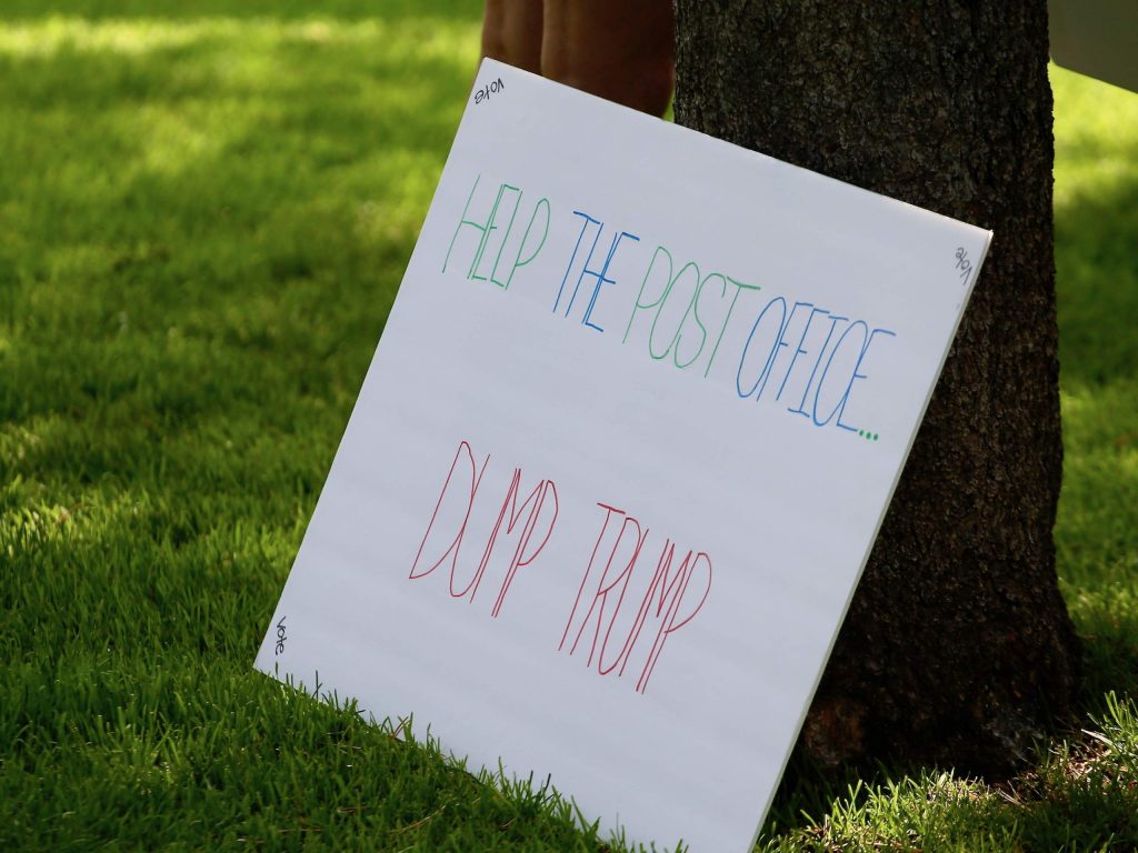 Small group marches in Aspen in effort to save the post office, protest ...