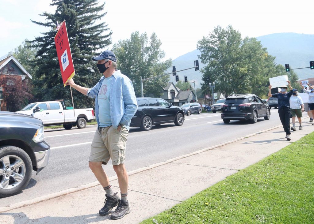 Small group marches in Aspen in effort to save the post office, protest ...