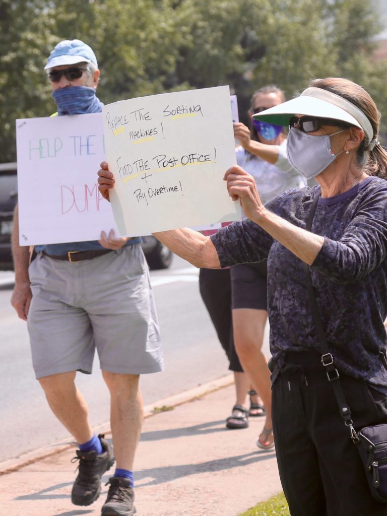 Small group marches in Aspen in effort to save the post office, protest ...