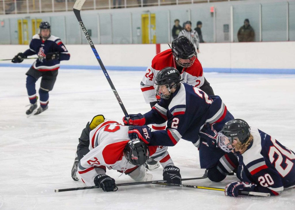 Down early, Aspen High hockey rallies back to beat Liberty in playoff ...