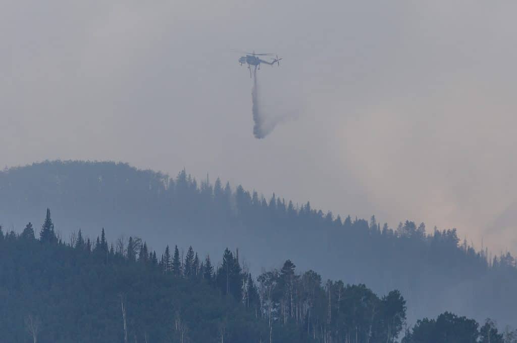 Welcome rain falls on Sylvan Fire as firefighting crews dig in for long ...