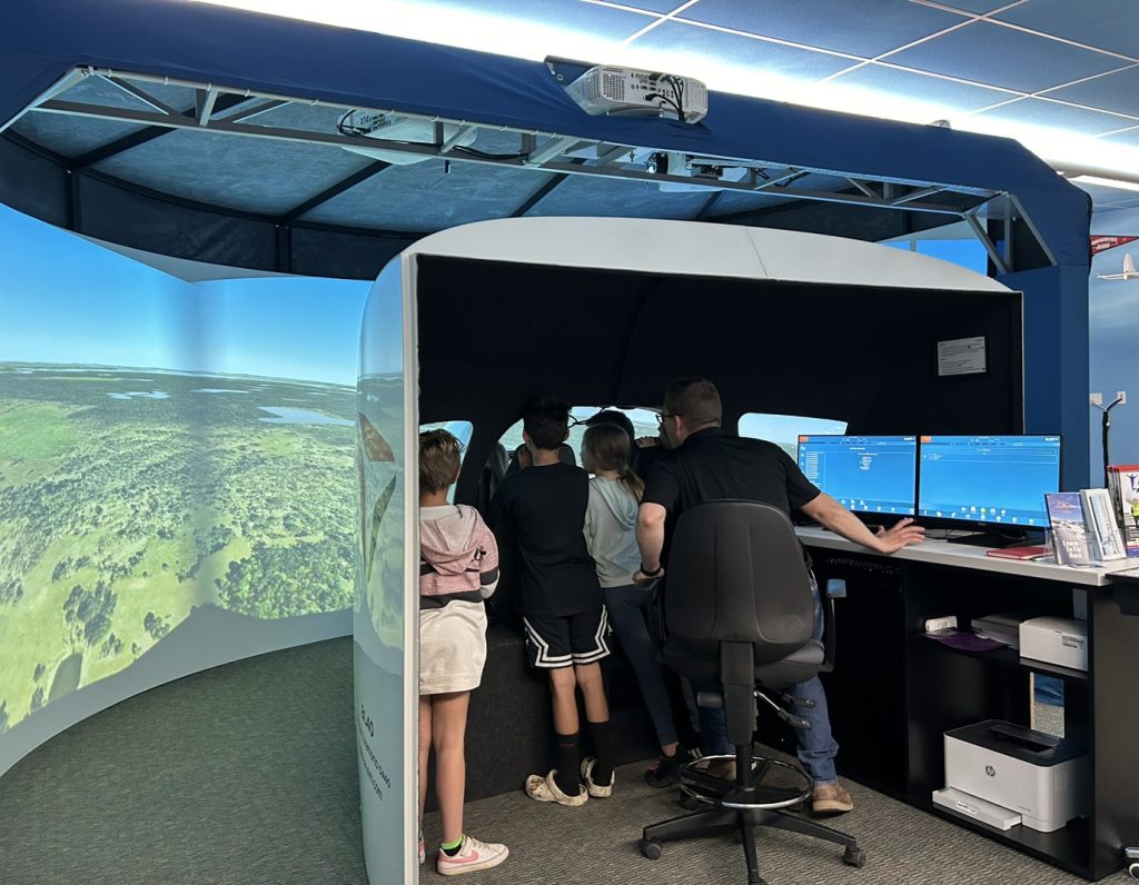 Aspen Elementary School students use flight simulator to better ...