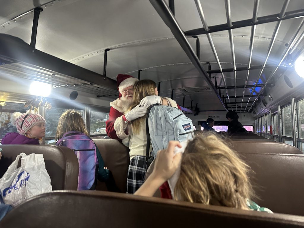 Santa rides the bus: Steamboat driver brings holiday magic to students ...