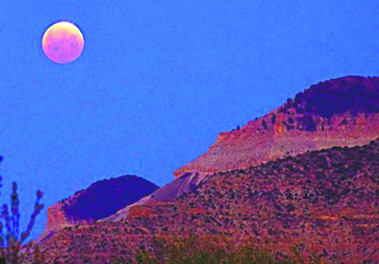 Photo: Blood moon over Parachute | PostIndependent.com