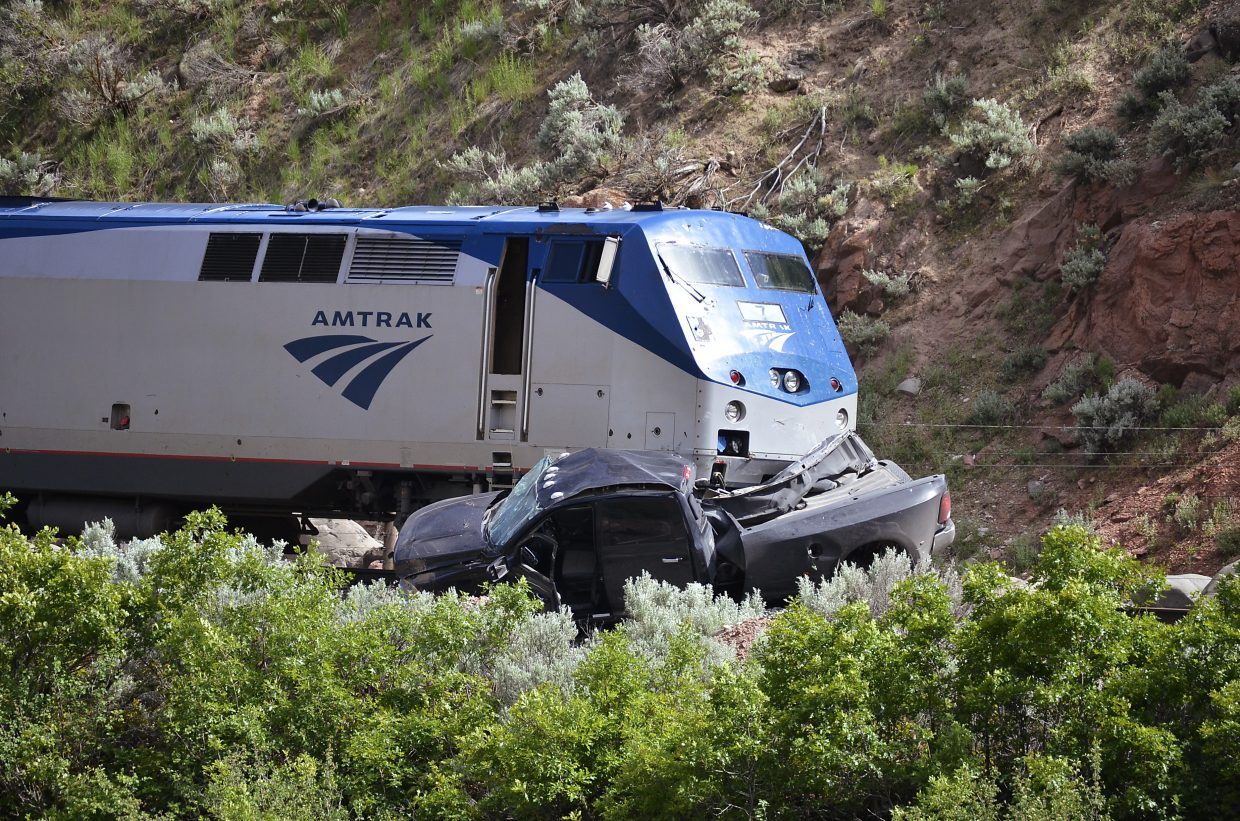 Amtrak train hits pickup west of Glenwood Springs; driver injured ...