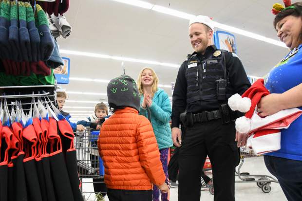 All smiles for Shop With A Cop at Glenwood Wal-Mart | PostIndependent.com