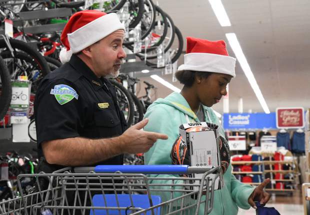 All smiles for Shop With A Cop at Glenwood Wal-Mart | PostIndependent.com
