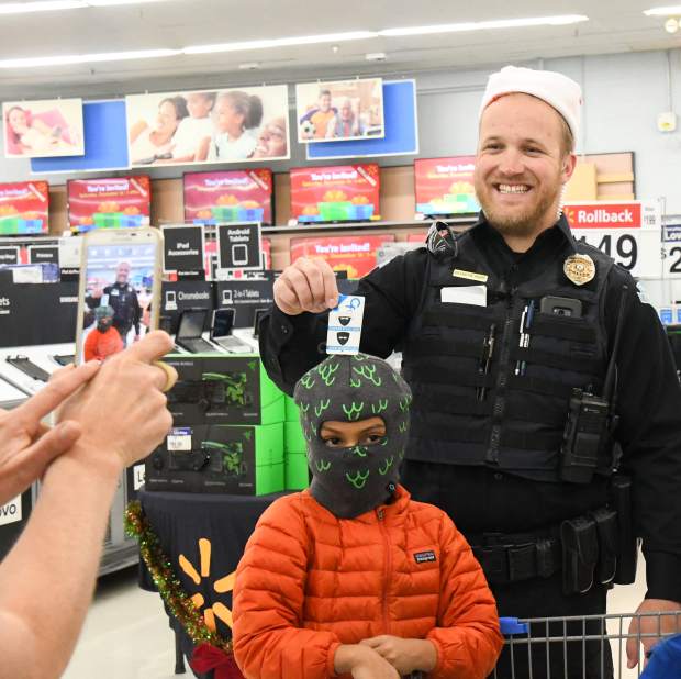 All smiles for Shop With A Cop at Glenwood Wal-Mart | PostIndependent.com