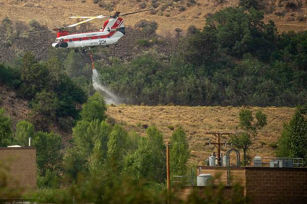 Worn out residents cheer lifting of more fire evacuations in Basalt and ...