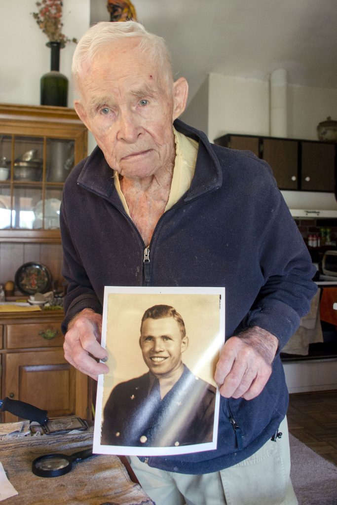 Carbondale resident, 10th Mountain Division vet John Tripp celebrates a ...