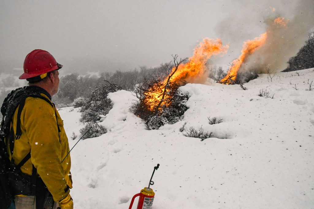 PHOTOS: Crews burn slash piles, create fire break south of Glenwood ...
