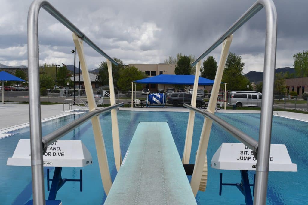Workers prepare Rifle Metro Pool for Memorial Day Weekend opener ...
