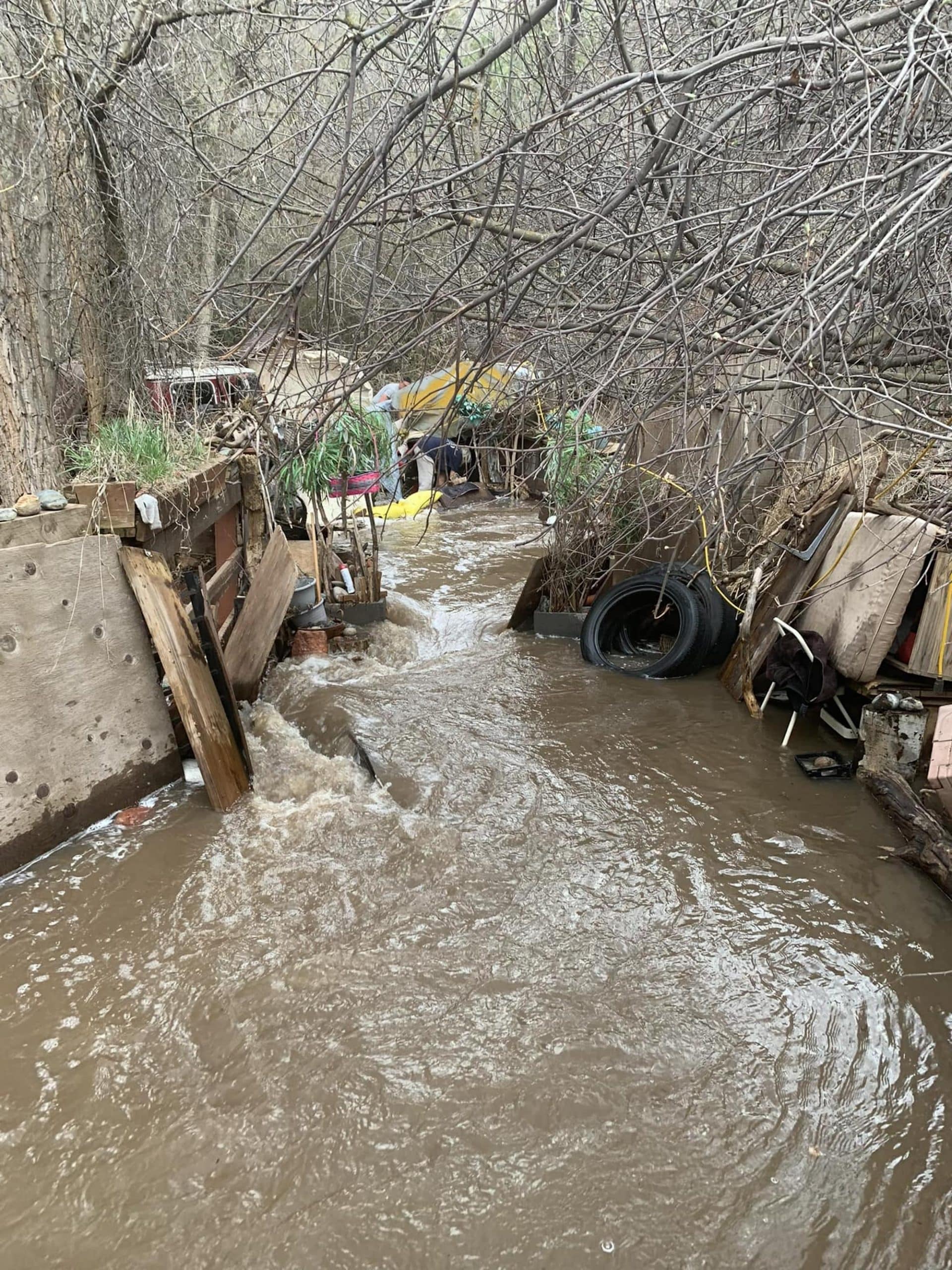 Debris and mud cover roads, trails, train tracks in Glenwood Springs ...