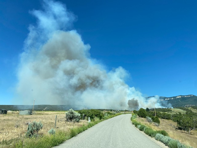 Air, ground crews spend Sunday quelling brush fire southwest of ...