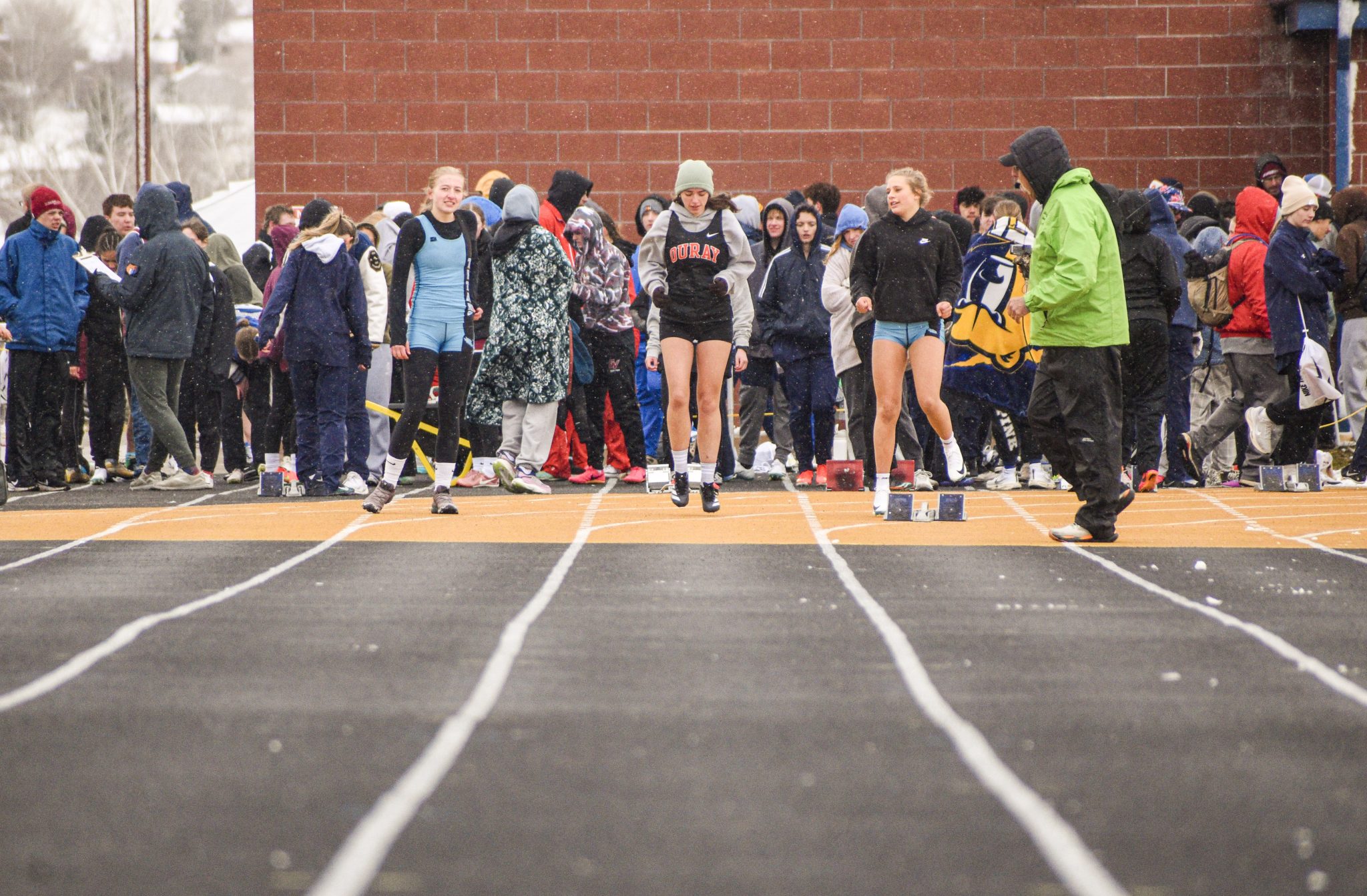 PHOTOS: Athletes battle cold, snow at Rifle track and field invite ...