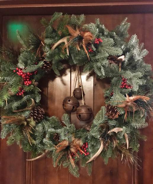 Susan Swimm displays custom faux floral arrangements at Slifer Designs ...