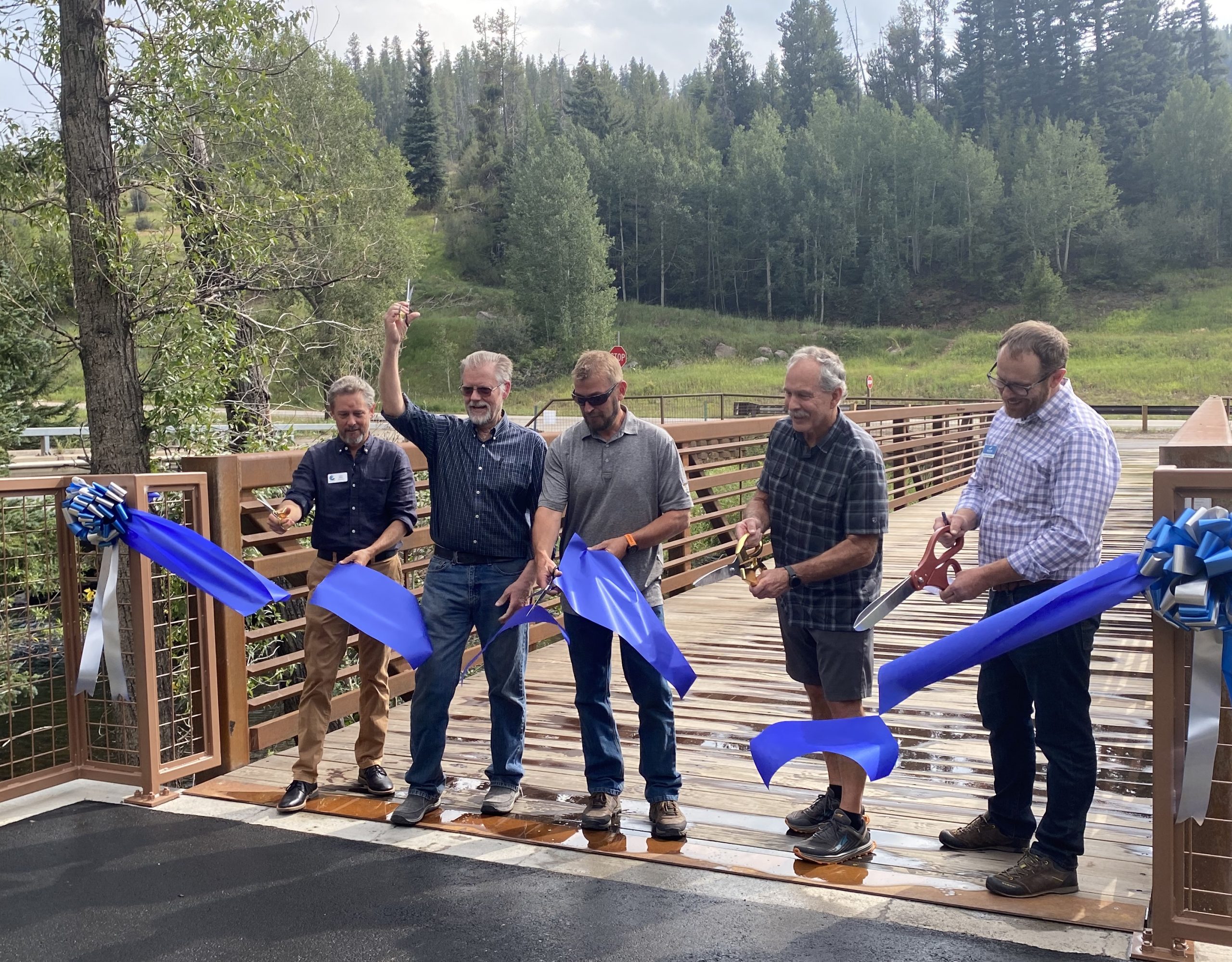 Minturn cuts ribbon on new sewer line, pedestrian bridge project ...
