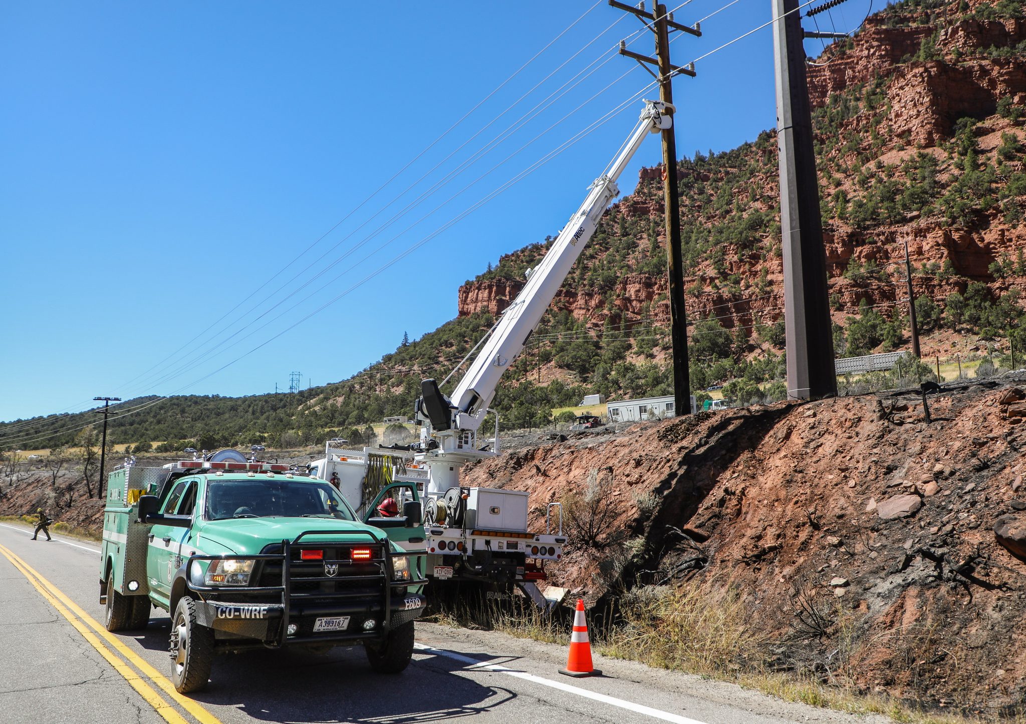 PHOTOS: Fire crews tamp down hot spots from wildfire between I-70 and ...