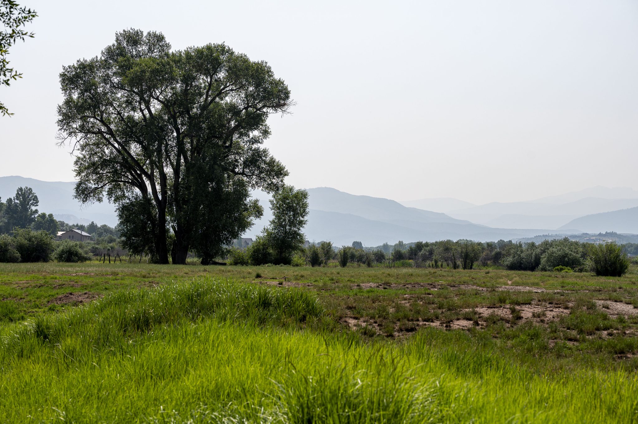 Haze wafts over Colorado mountain towns from wildfires burning within ...