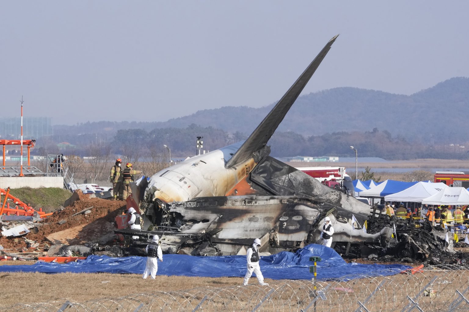Jetliner skids off runway and bursts into flames in South Korea ...