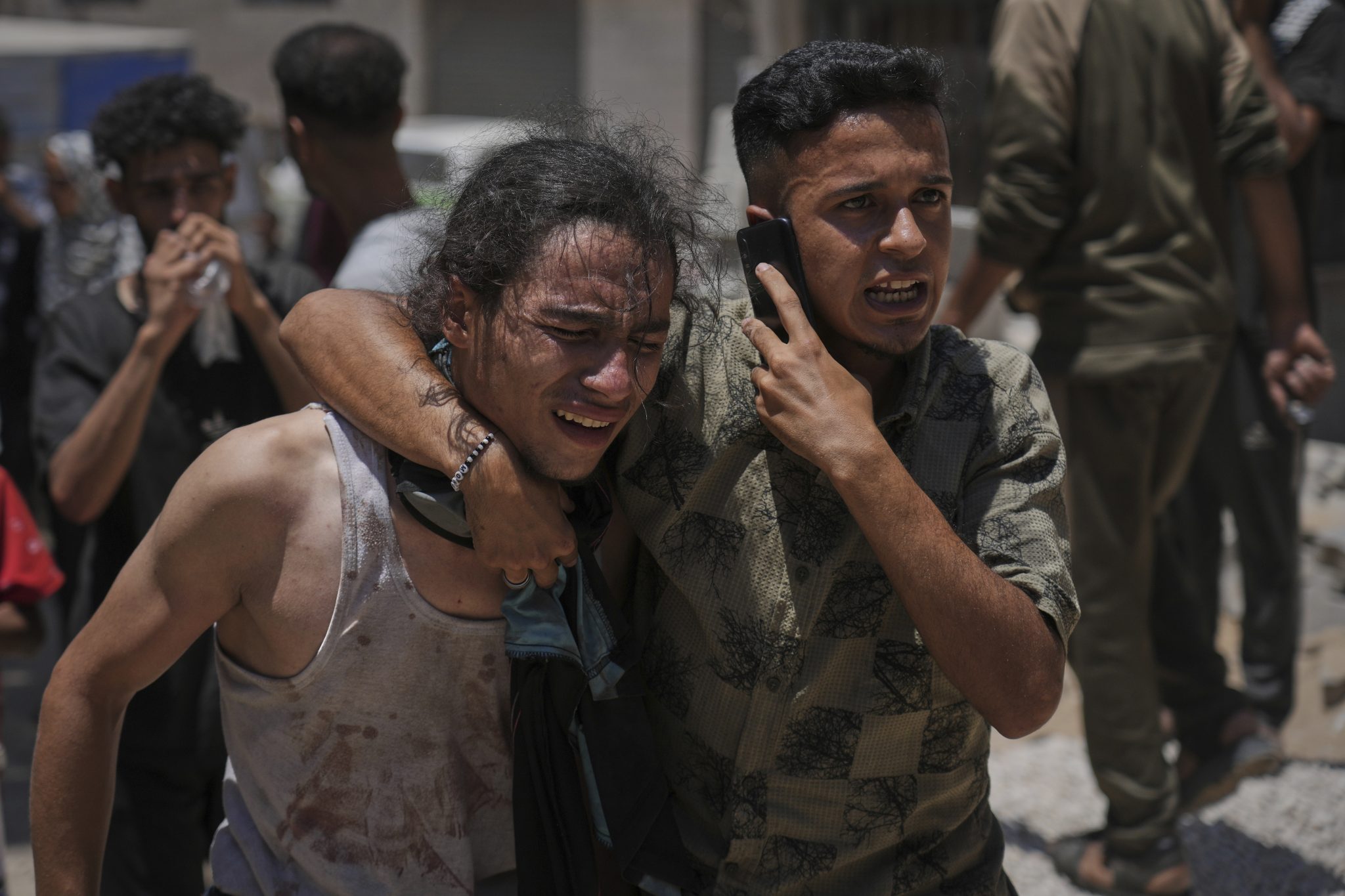 Officials say 85 Palestinians seeking aid are killed in Gaza as Israel ...