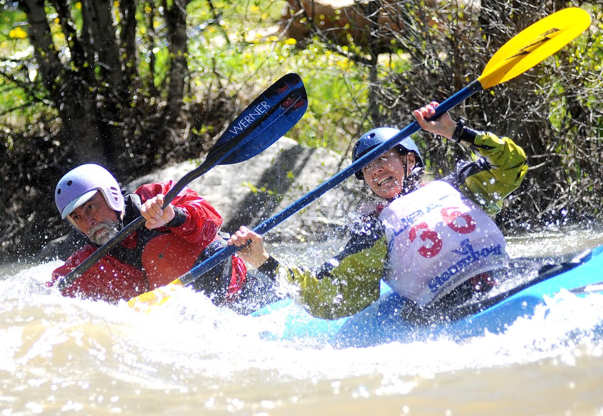 Paddlers cut up the Yampa River during Steamboat festival ...