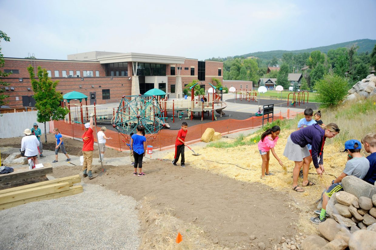 Soda Creek students help build outdoor classroom, garden ...