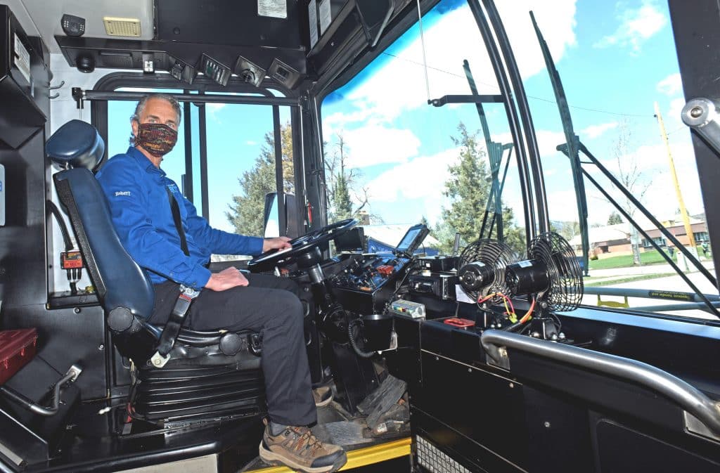 Faces of the Frontlines: Making sure the wheels on the bus keep going ...