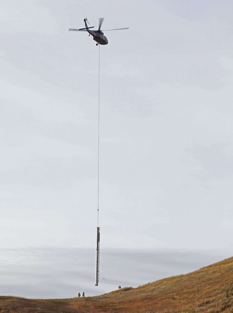Helicopter lifts towers onto Howelsen Hill as new chairlift starts to ...
