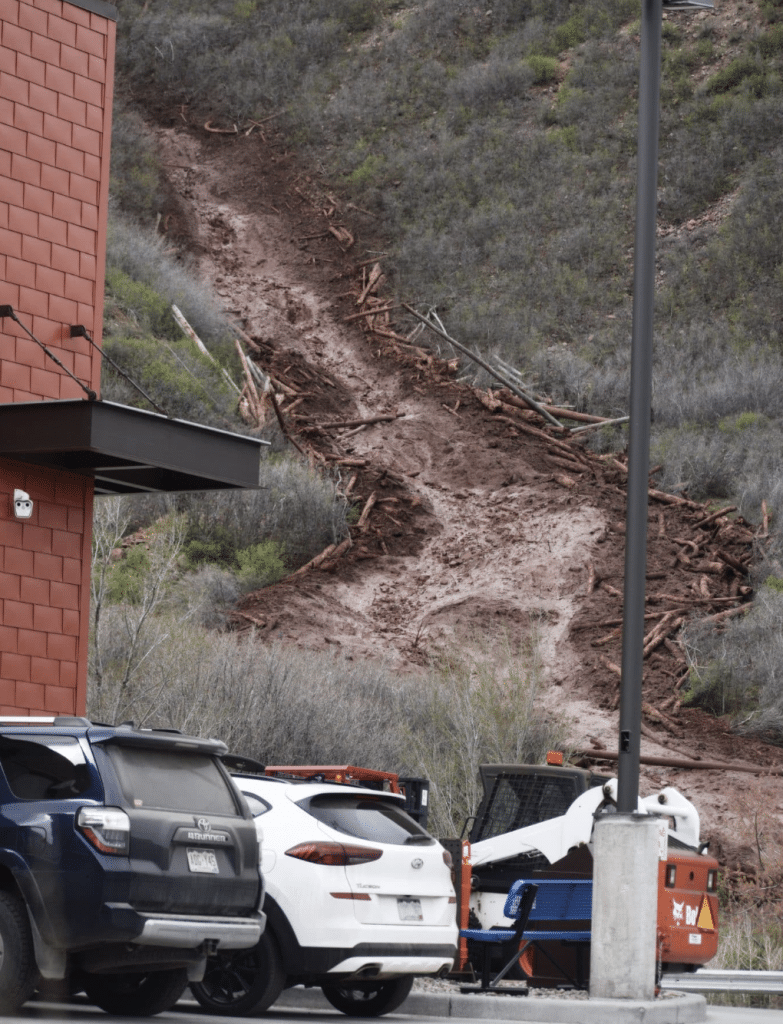Debris and mud cover roads, trails, train tracks in Glenwood Springs ...