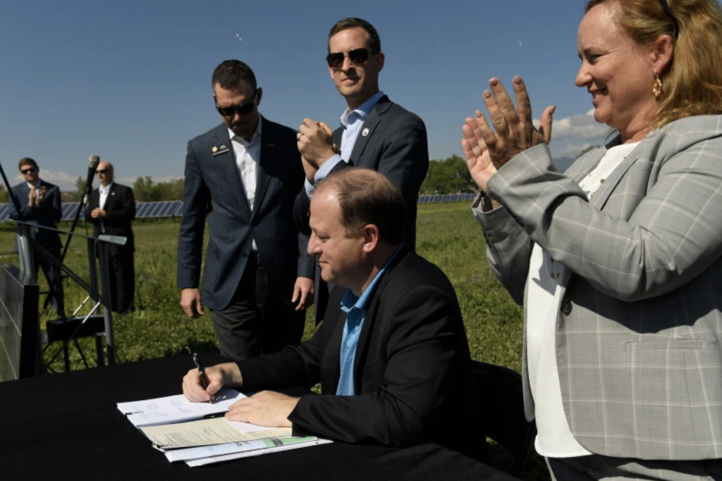 Gov. Polis signs 7 bills on renewable energy, but what does that mean ...