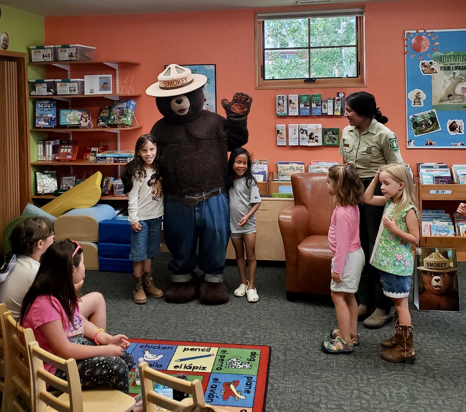 Smokey the Bear visits local libraries, educates children about fire ...