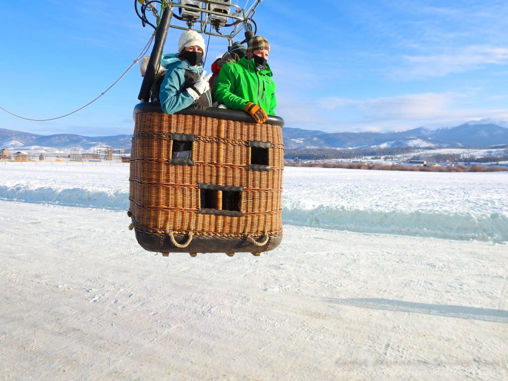 Take to the skies in a wicker basket to tour the snowy Rocky Mountain ...