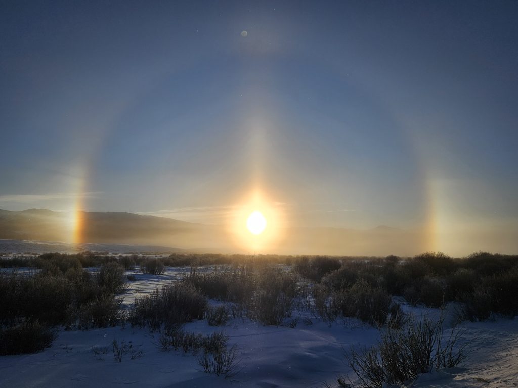 Reader photos: sunset, sundog and the full moon | SkyHiNews.com