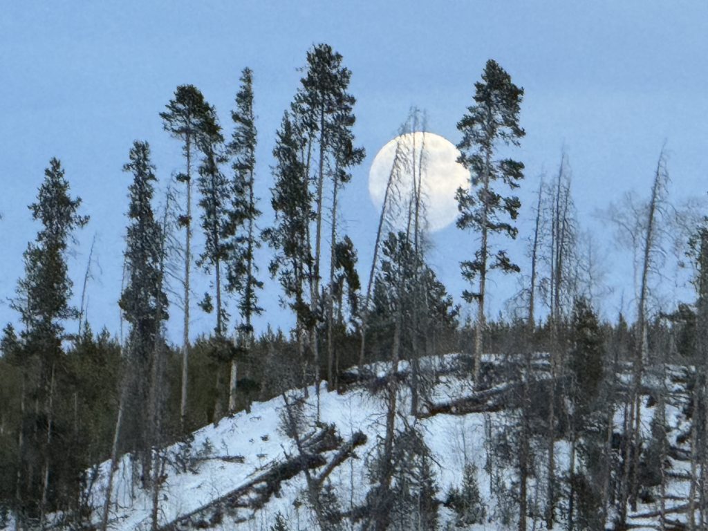 Reader photos: sunset, sundog and the full moon | SkyHiNews.com