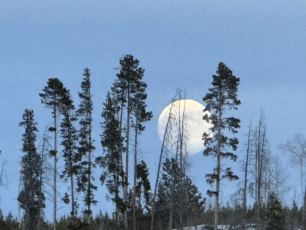 Reader photos: sunset, sundog and the full moon | SkyHiNews.com
